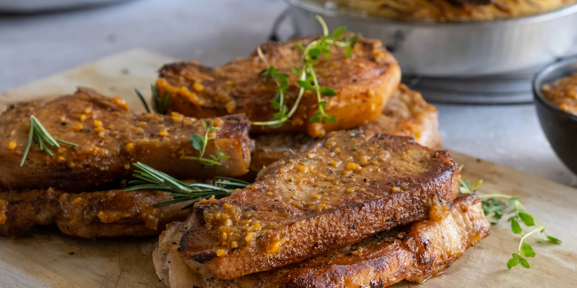Eskort - Pork Chops with Stewed Fruit and Potato Bake - Eskort